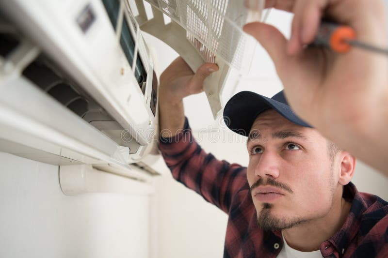 Concentrated Man Fixing Air Conditioning Stock Photo - Image of connect ...