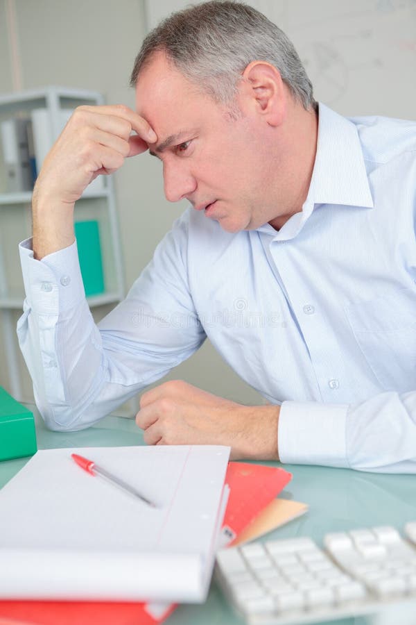 Concentrated Man Looking at Papers Stock Image - Image of lifestyle ...