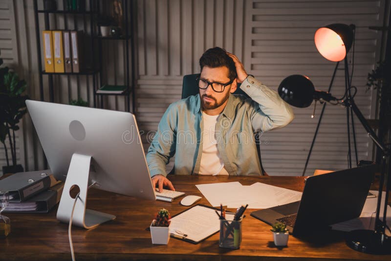 Focused Male Professional Working Late at Home Office Desk with Modern ...