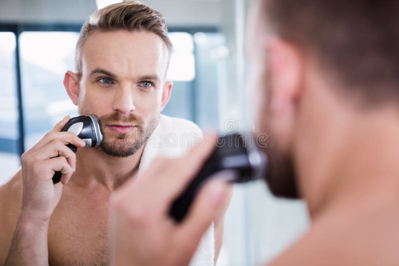 Concentrated Man Shaving His Beard Stock Image - Image of pajamas ...