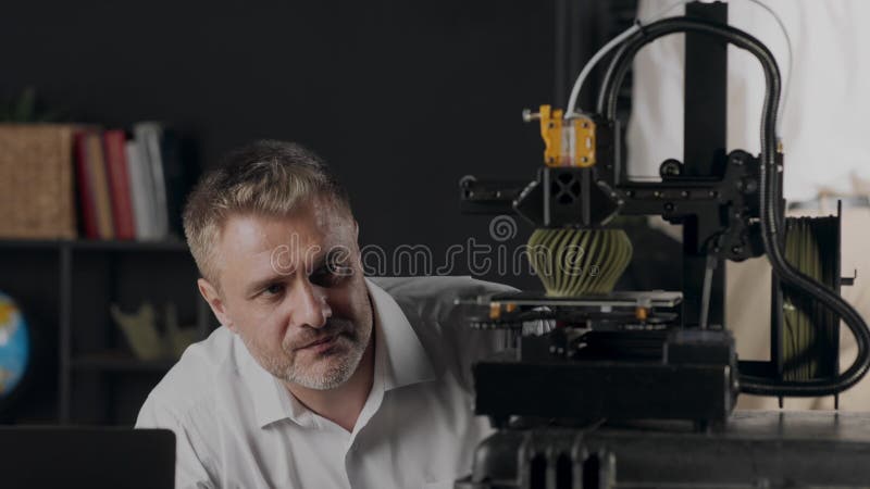 A Concentrated Middle Aged Man Scientist Observes the Working Process ...