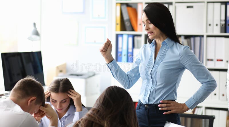 Serious Brunette Businesswoman Training Her Young Team Stock Image ...