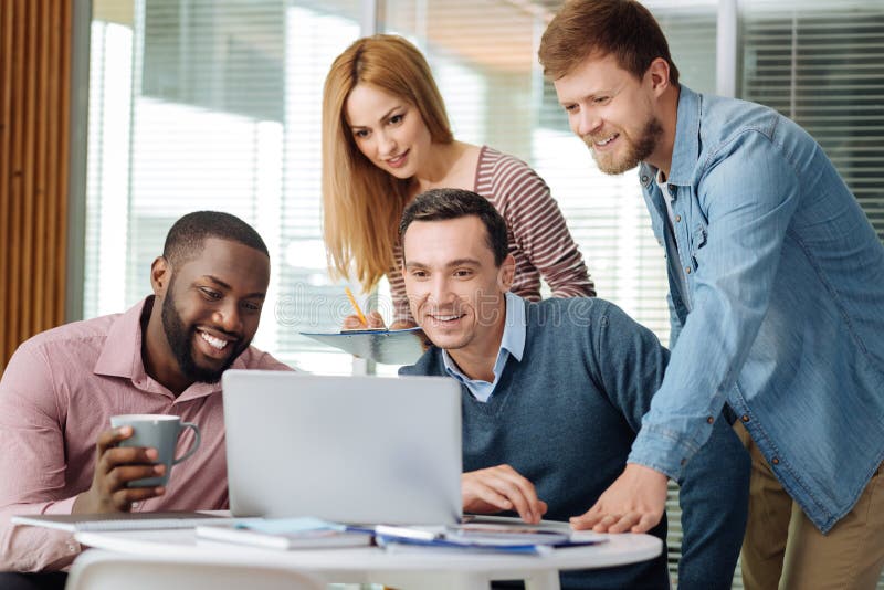 Concentrated People Watching News on Computer Stock Photo - Image of ...