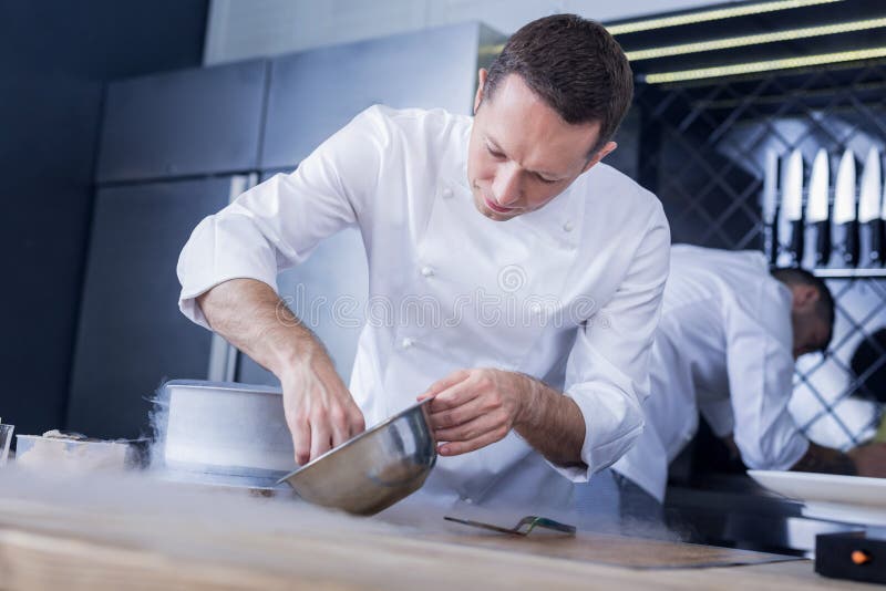 Concentrated Pleasant Cook Doing His Work Perfectly Stock Image - Image ...
