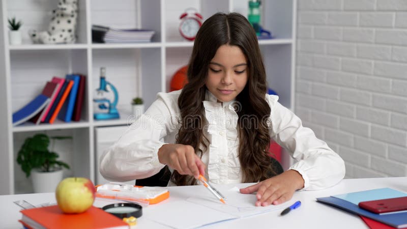 Concentrated Pupil Girl in School Uniform Use Compass Tool in Classroom ...