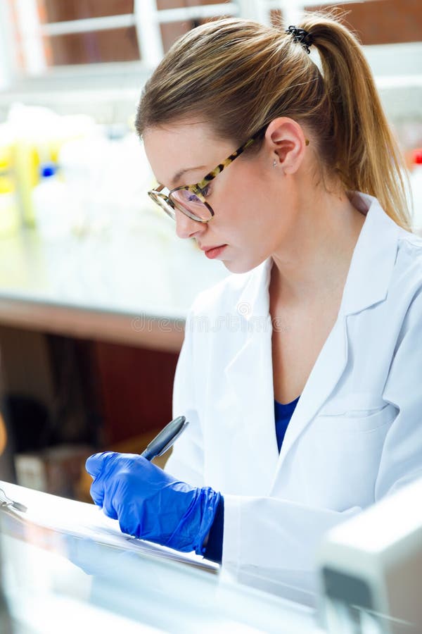 Concentrated Scientist Making Experiment in Laboratory. Stock Image ...