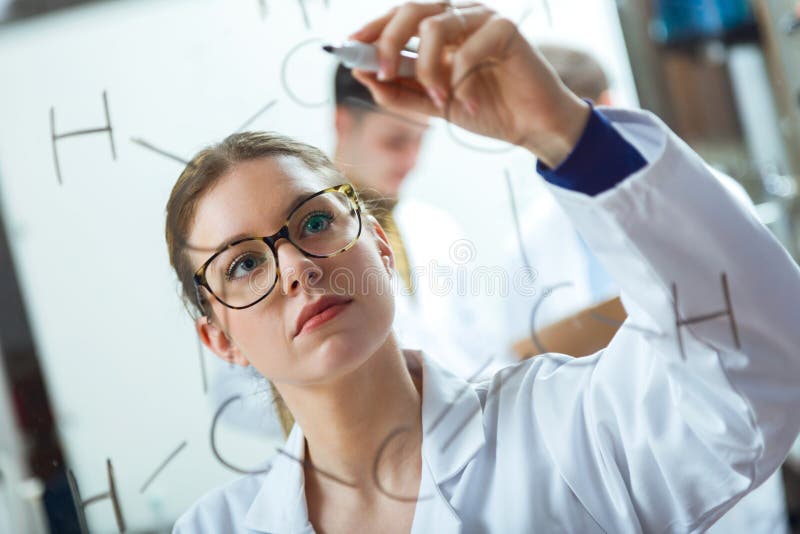 Concentrated Scientist Making Experiment in Laboratory. Stock Image ...