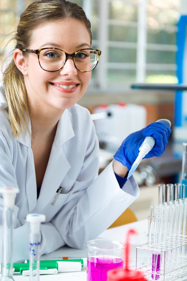Concentrated Scientist Making Experiment in Laboratory. Stock Photo ...