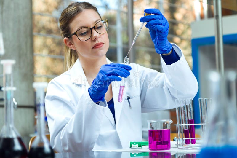 Concentrated Scientist Making Experiment in Laboratory. Stock Image ...