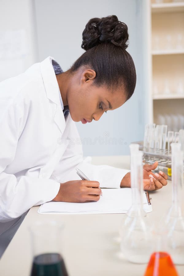 Concentrated Scientist Taking Notes Stock Image - Image of notes ...