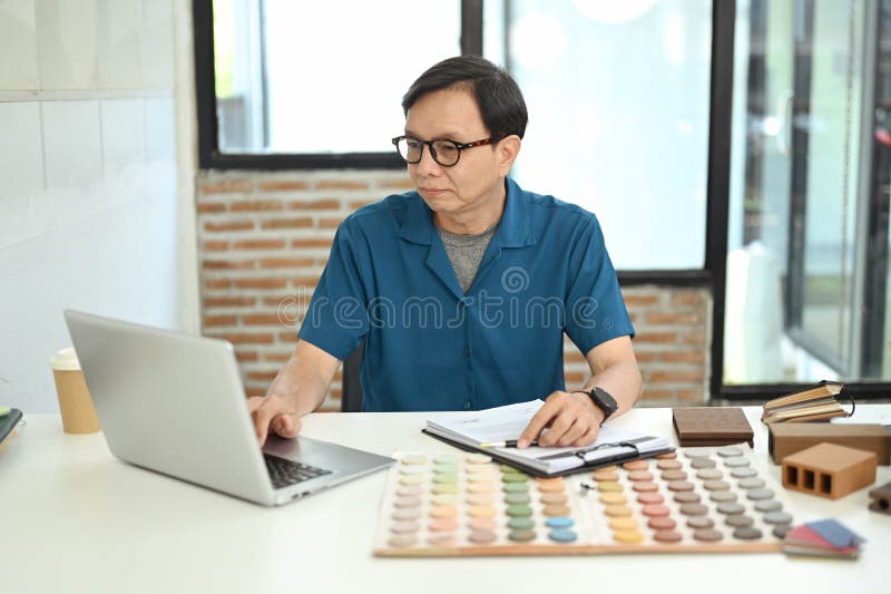 Male Interior Designer Expert Showing Color Palette while Helping ...