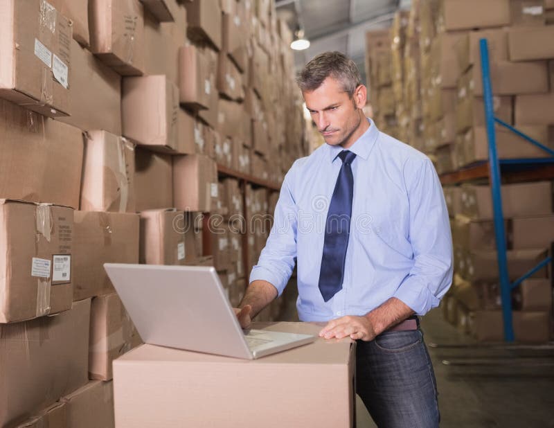 Warehouse Manager Talking with Worker Stock Photo - Image of industry ...
