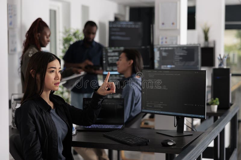 Concentrated Web Developer Working with Hologram and Coding Language ...