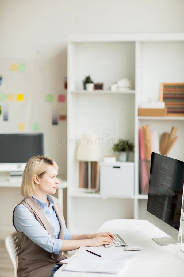 Concentrated Woman Coding Information on Computer Stock Photo - Image ...