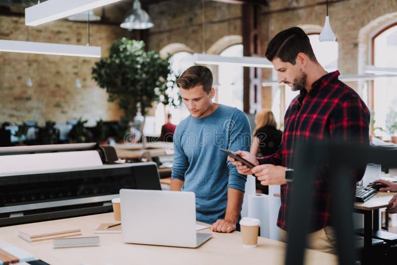 Concentrated Young Colleagues Working on the Project Stock Image ...