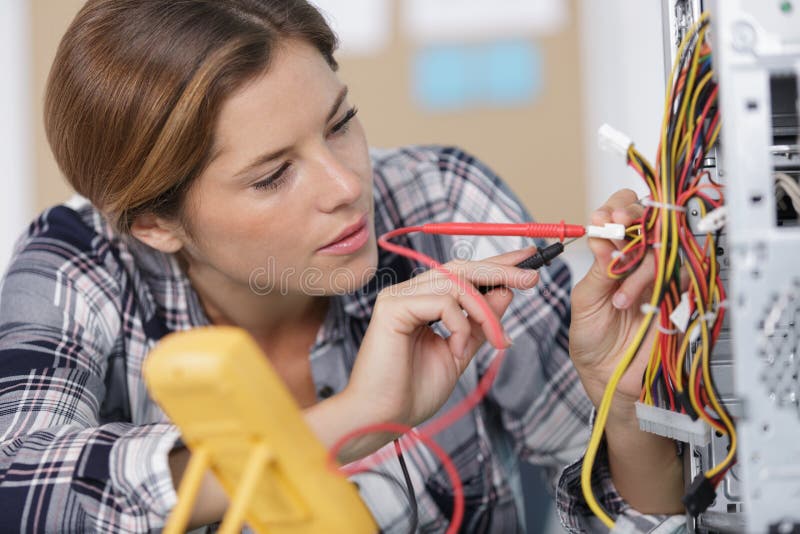 Concentrated Young Female Pc Technician in Class Stock Image - Image of ...