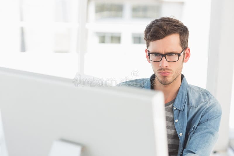 Concentrated Young Male Artist Using Computer Stock Image - Image of ...