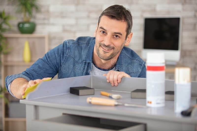 Concentrated Young Man Assembling Cabinet Stock Image - Image of ...