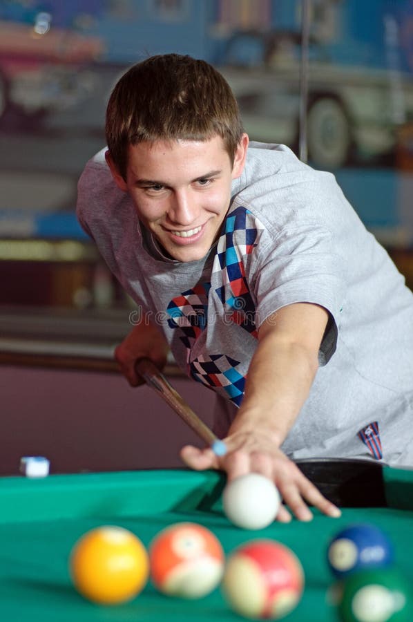 Concentrated Young Man Playing Snooker Stock Image - Image of stick ...