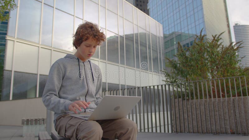 Concentrated Young Programmer Freelancer Looking at Laptop Screen ...