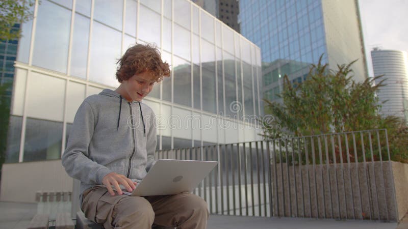Concentrated Young Programmer Freelancer Looking at Laptop Screen ...
