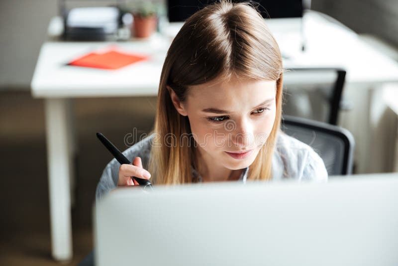 Concentrated Young Woman Work in Office Using Computer Stock Image ...