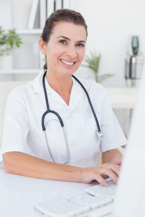 Concentrating Doctor Using Computer Stock Image - Image of adult ...