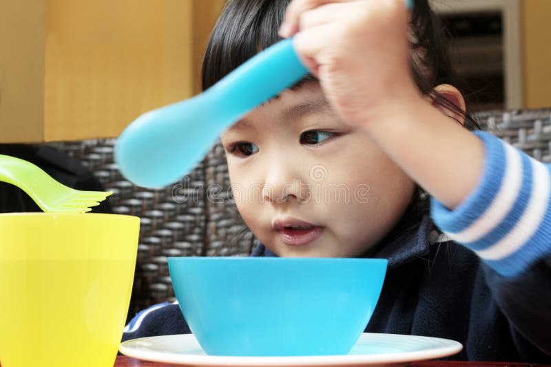 Concentration of 5 Years Old Asian Child Stock Photo - Image of child ...