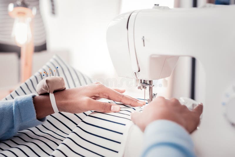 Close Up of Sewing Process in Well Equipped Showroom Stock Photo ...