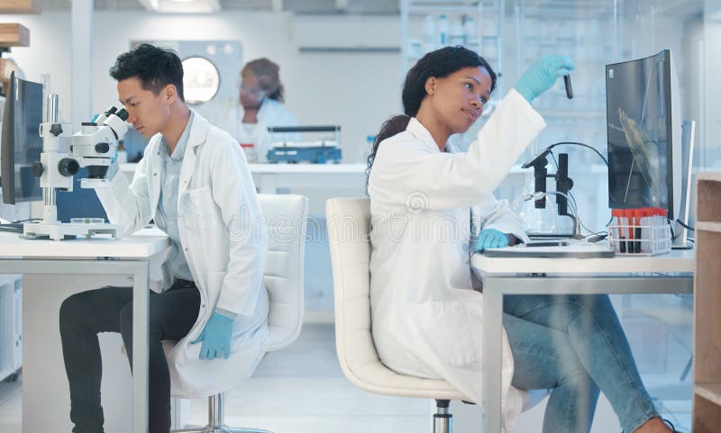 Concentration is at Its Peak. a Young Lab Technician Analysing a Test ...