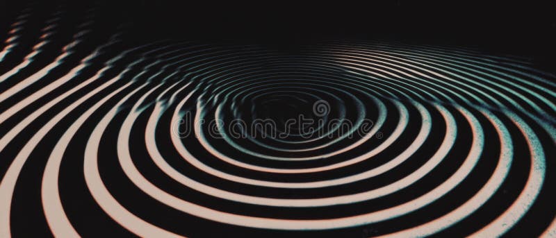 Concentric Film Grain Patterns Create Dynamic Texture on a Black ...