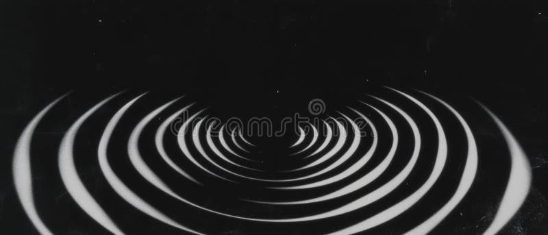 Concentric Film Grain Patterns Creating a Dynamic Visual Effect on a ...