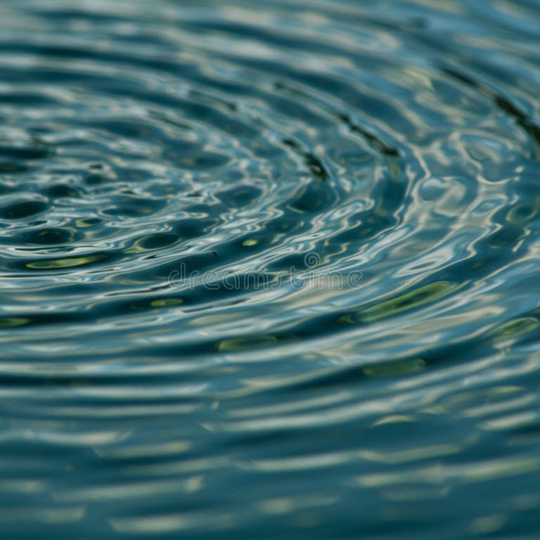Concentric Ripples on a Surface of Dark Green Water, Creating a ...