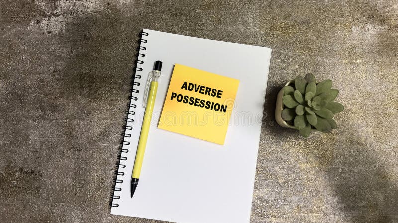 Concept of Adverse Possession Write on Sticky Notes Isolated on Wooden ...