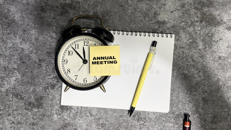 Concept of Annual Meeting Write on Sticky Notes Isolated on Wooden ...