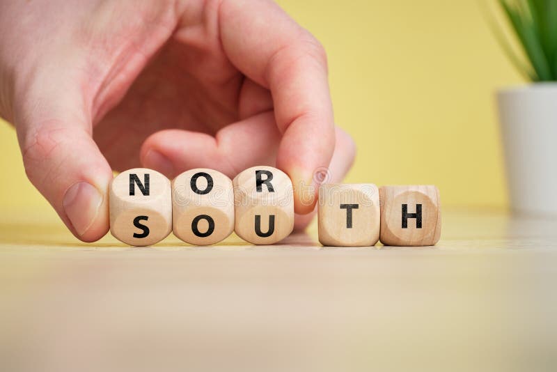 Concept of Antonym North and South on Wooden Blocks Stock Photo - Image ...