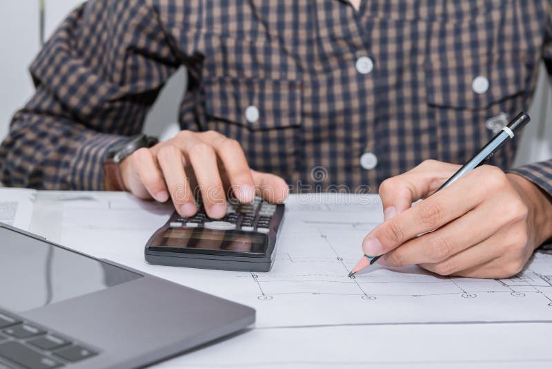Concept Architects, Hand of Asian Young Man Engineer Using Calculator ...