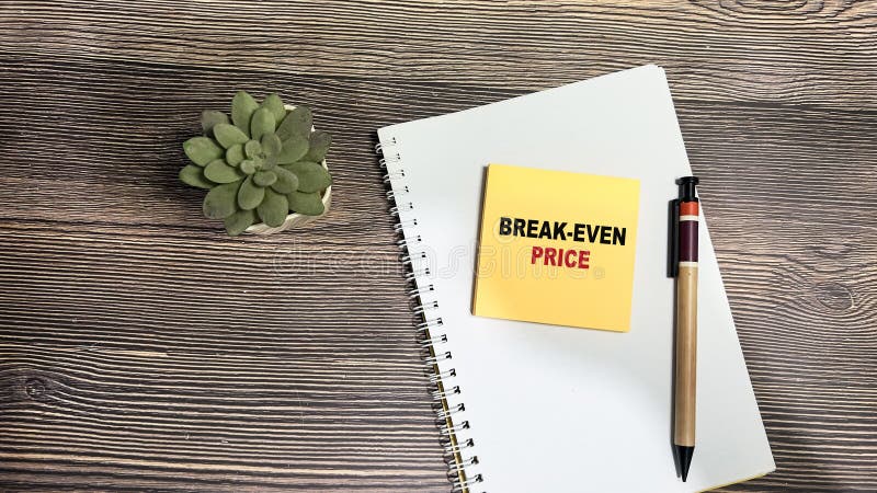 Concept of Break-Even Price Write on Sticky Notes Isolated on Wooden ...