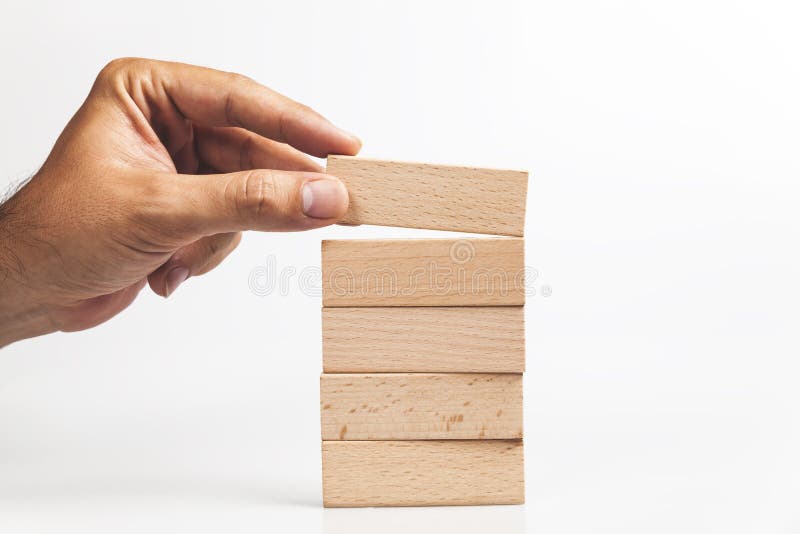 Hand Put Wooden Blocks on the Stack of Wooden Blocks Stock Photo ...
