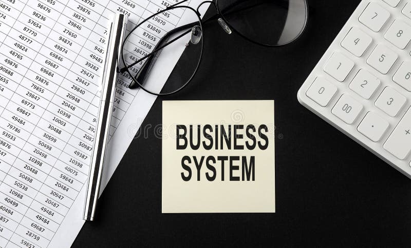 Concept BUSINESS SYSTEM Message on Sticker with Glasses,chart and ...
