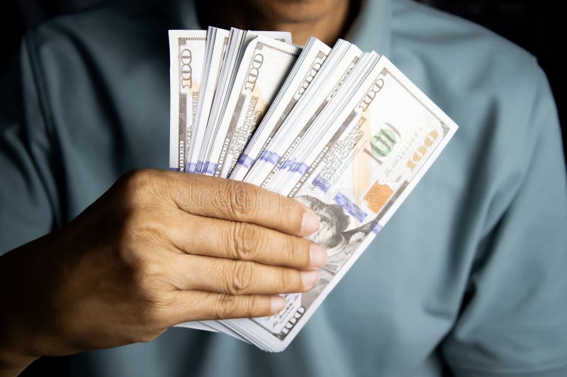 Concept of a Businessman Holding a Dollar, the World& X27;s Main ...