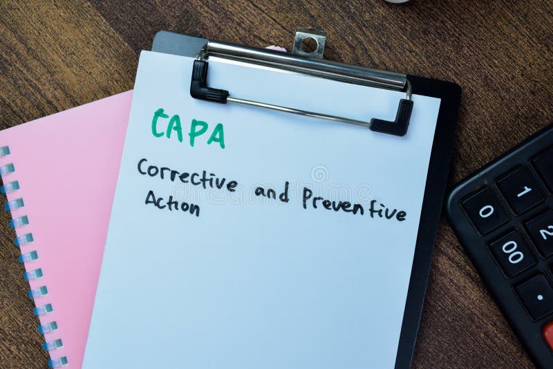 Concept of CAPA - Corrective and Preventice Action Write on Paperwork ...