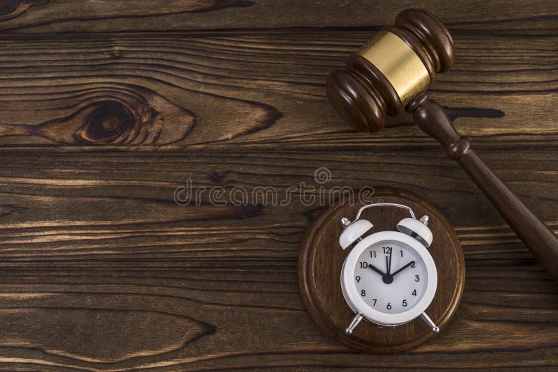 The Concept of a Clock and a Hammer by the Judge. Stock Photo - Image ...