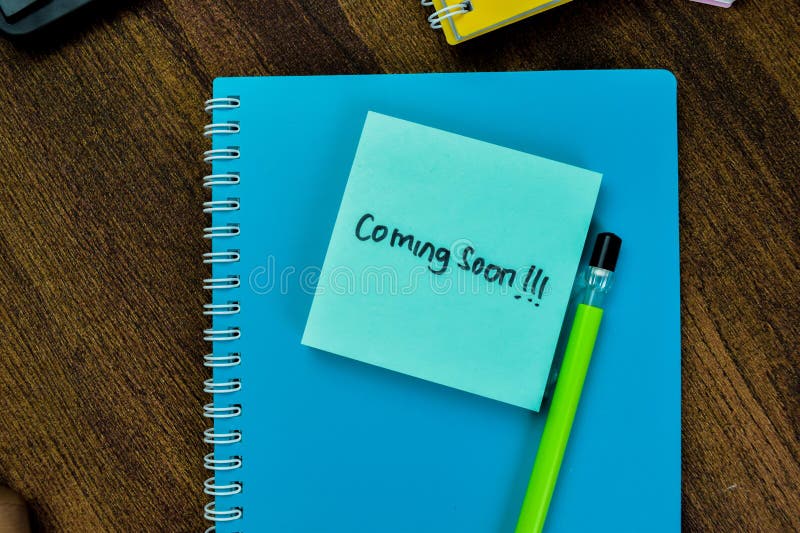 Concept of Coming Soon!!! Write on Sticky Notes Isolated on Wooden ...