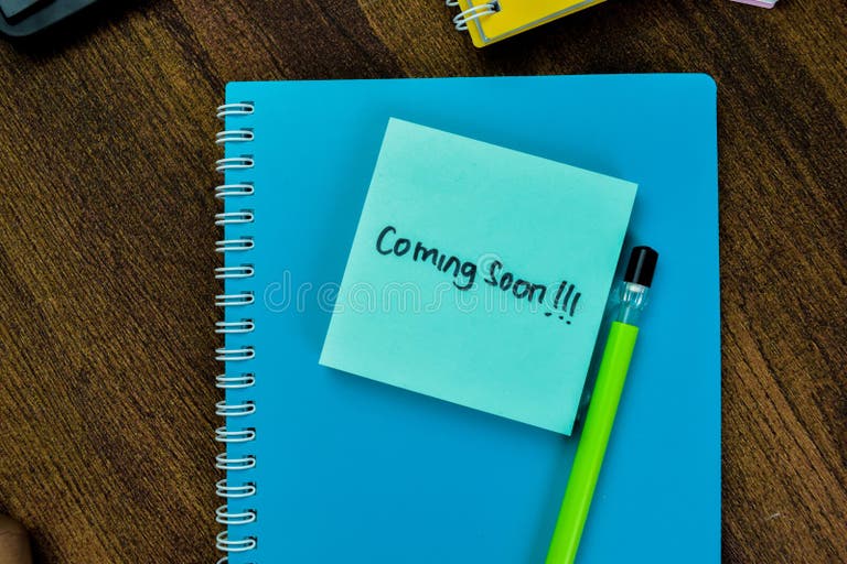 Concept of Coming Soon!!! Write on Sticky Notes Isolated on Wooden ...