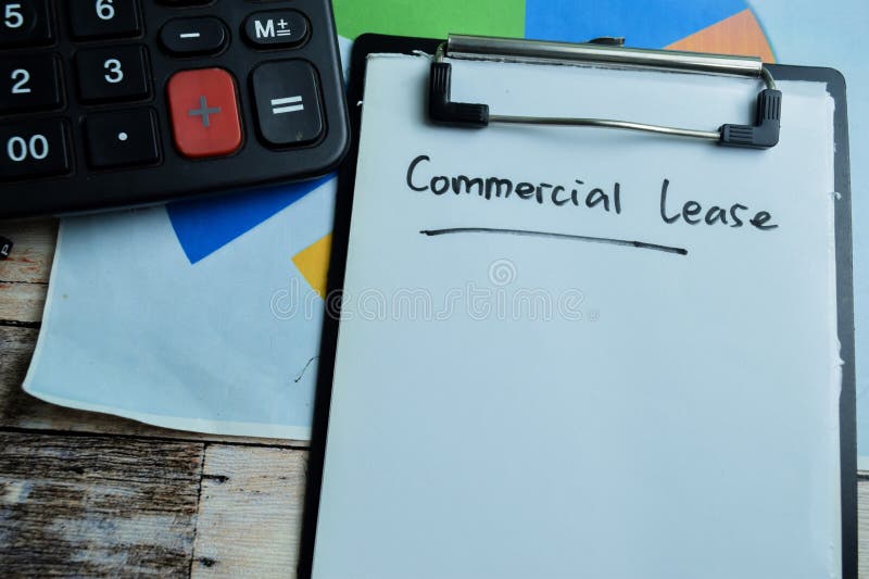 Concept of Commercial Lease Write on Paperwork Isolated on Wooden ...