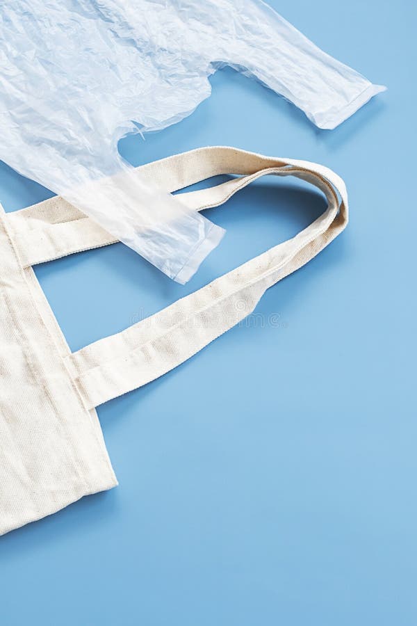Concept of Comparison Reusable Textile Bag and Disposable Plastic ...