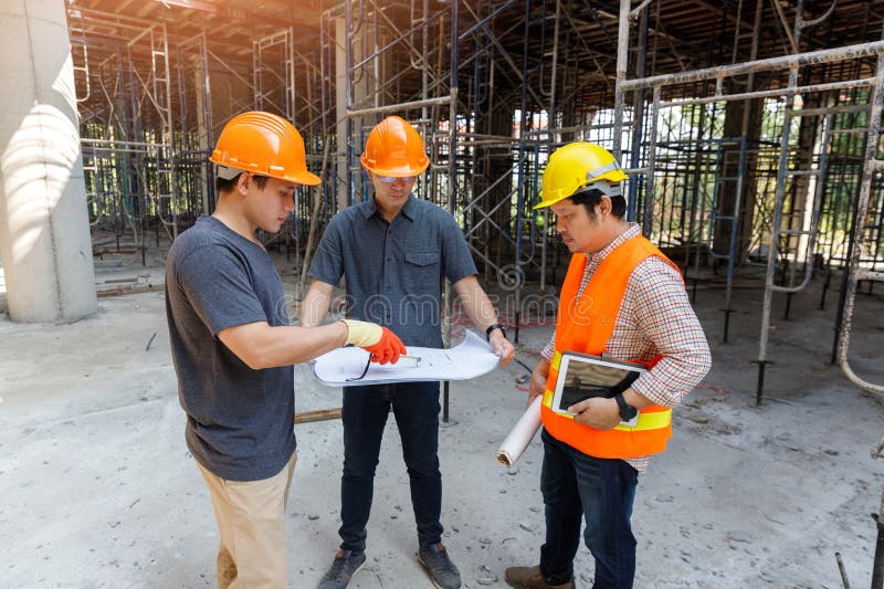 Concept of Construction. Engineer, Architect and Designer Working ...