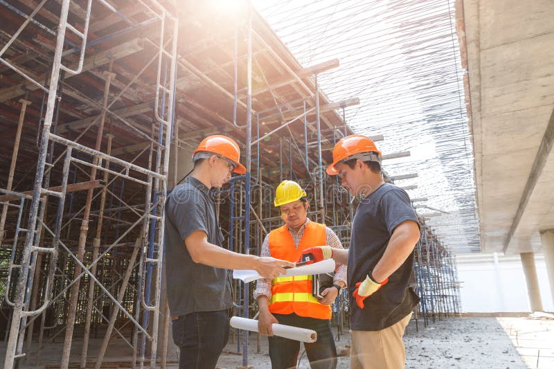 Concept of Construction. Engineer, Architect and Designer Working ...