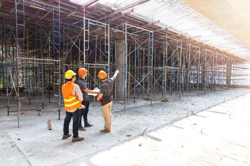 Concept of Construction. Engineer, Architect and Designer Working ...